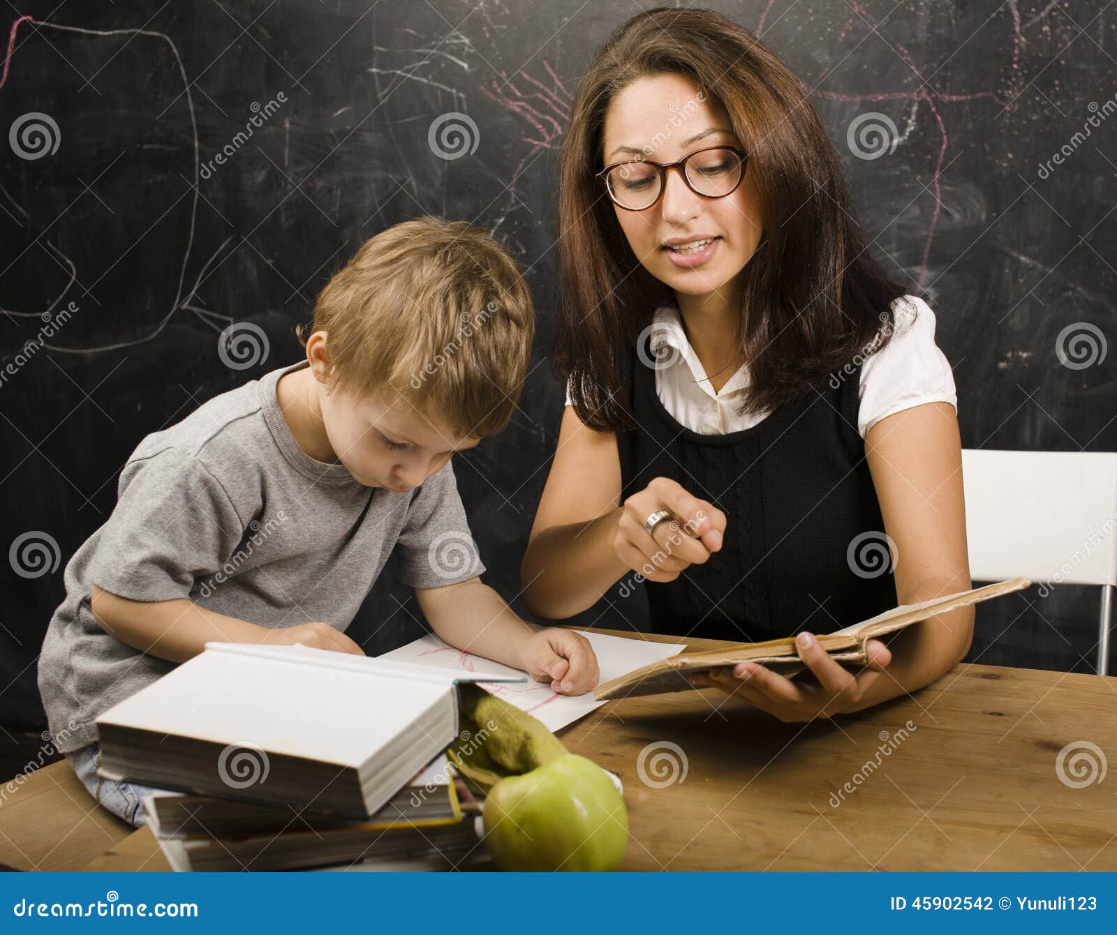 Little Cute Boy with Teacher in Classroom Stock Photo - Image of ...