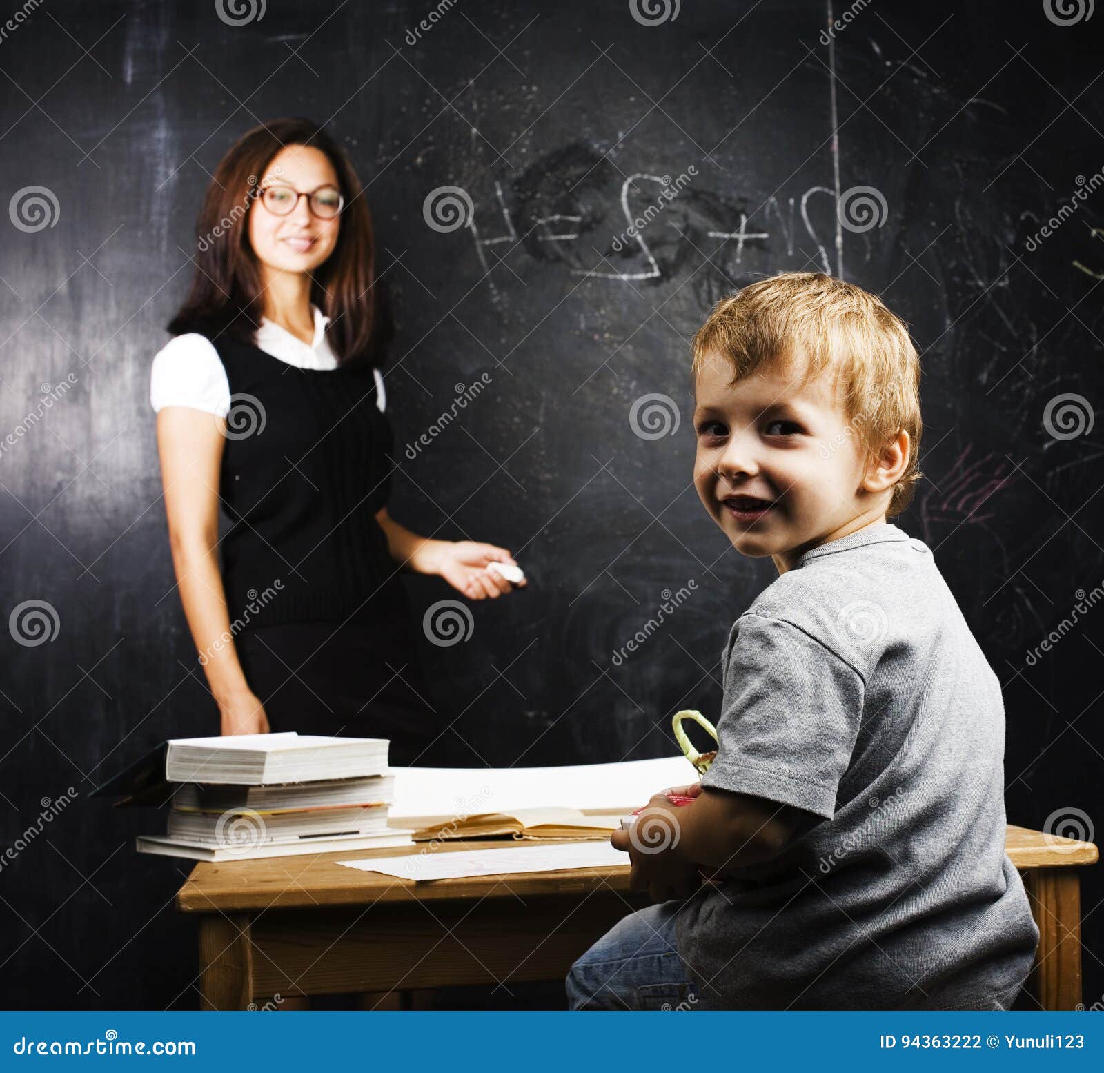 Little Cute Boy with Teacher in Classroom Stock Photo - Image of ...