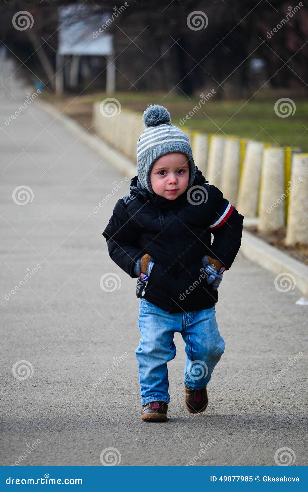 Little cute boy walking stock image. Image of cute, close - 49077985