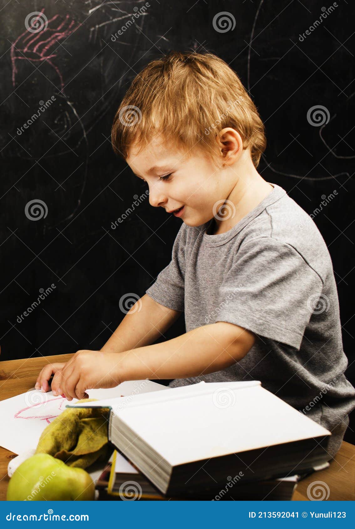 Little Cute Boy with Young Teacher in Classroom Studying at Blackboard ...