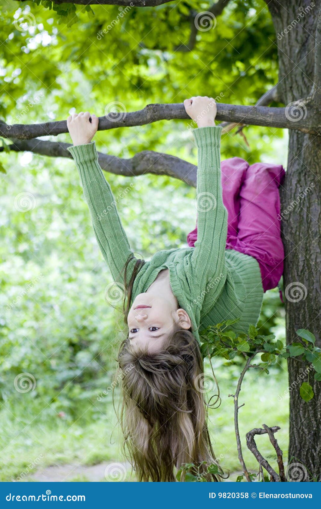 Little Cute Girl Hanging from Branch of Tree. Stock Photo - Image of ...