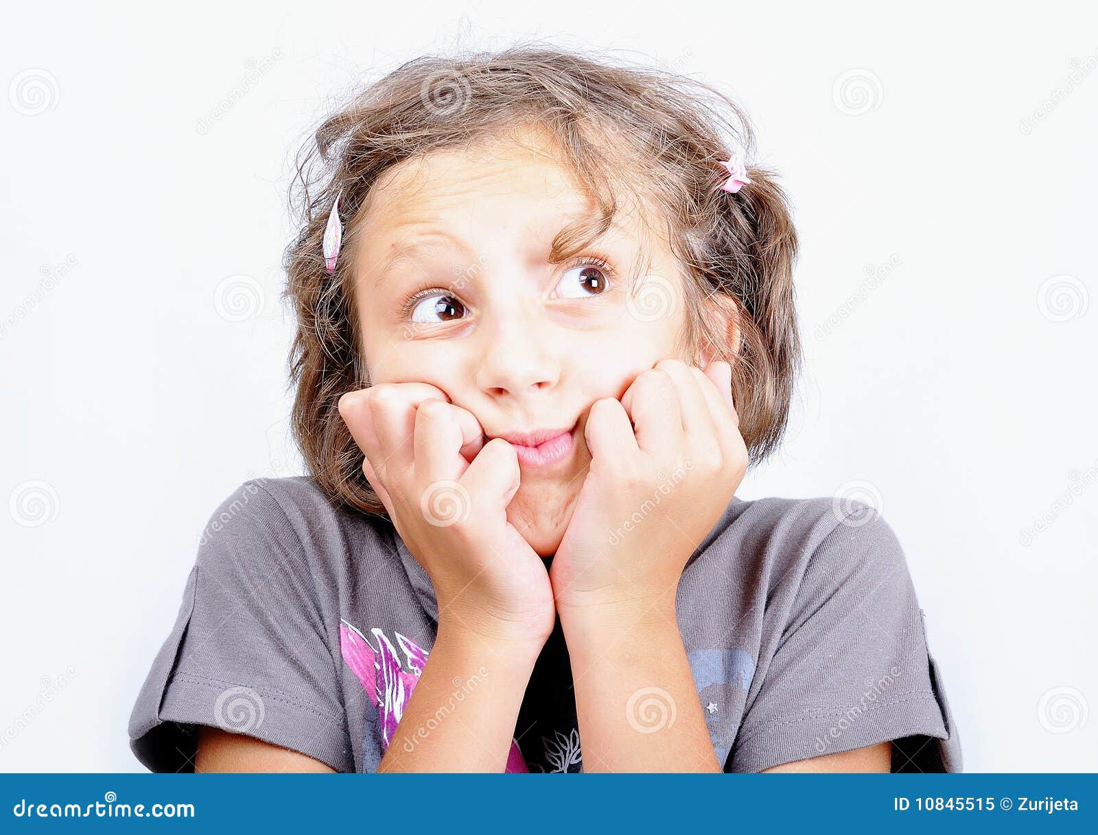 A Little Cute Girl With Strange Expression On Face Royalty Free Stock ...