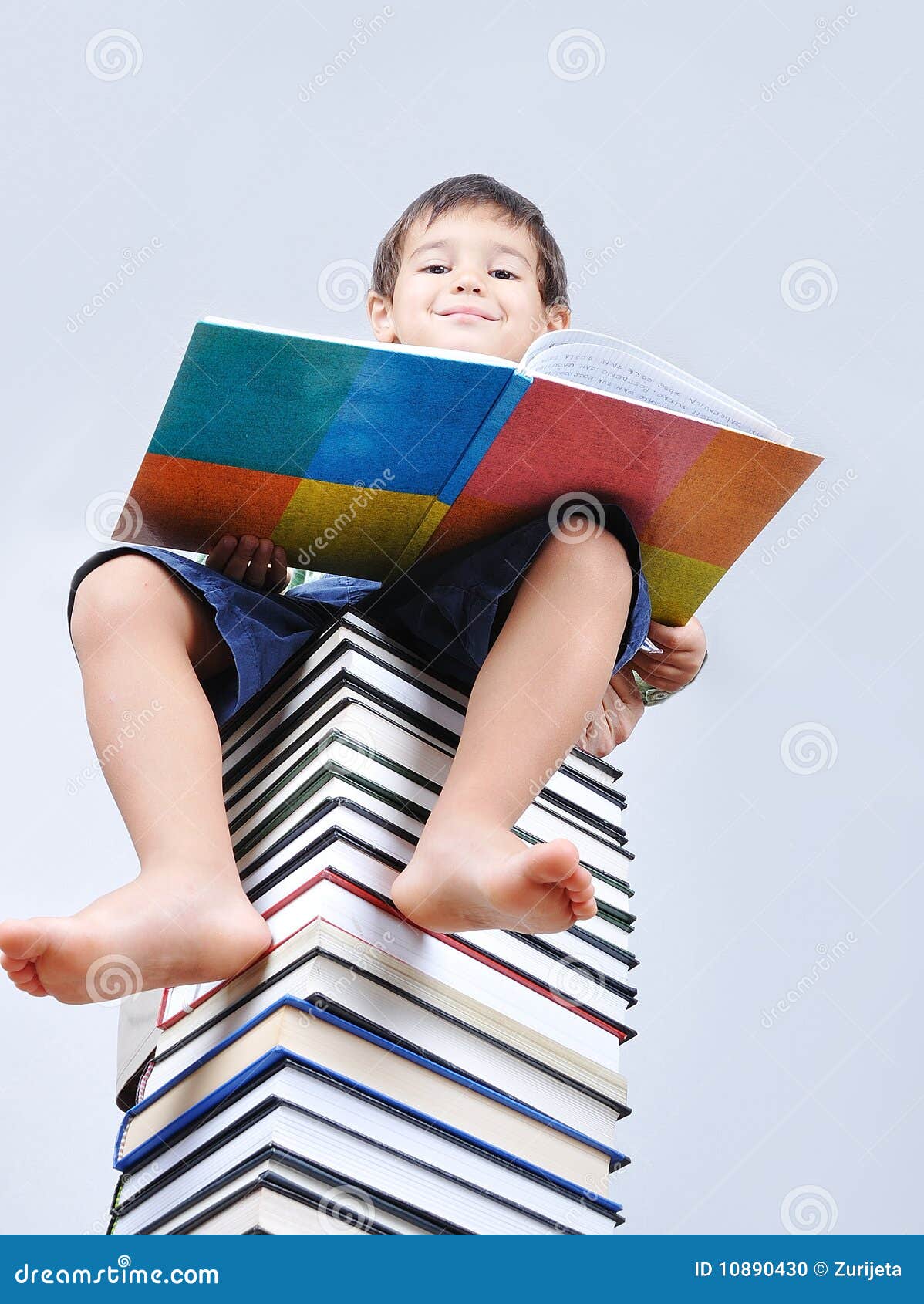 A Little Cute Kid and Books Stock Photo - Image of cute, caucasian ...