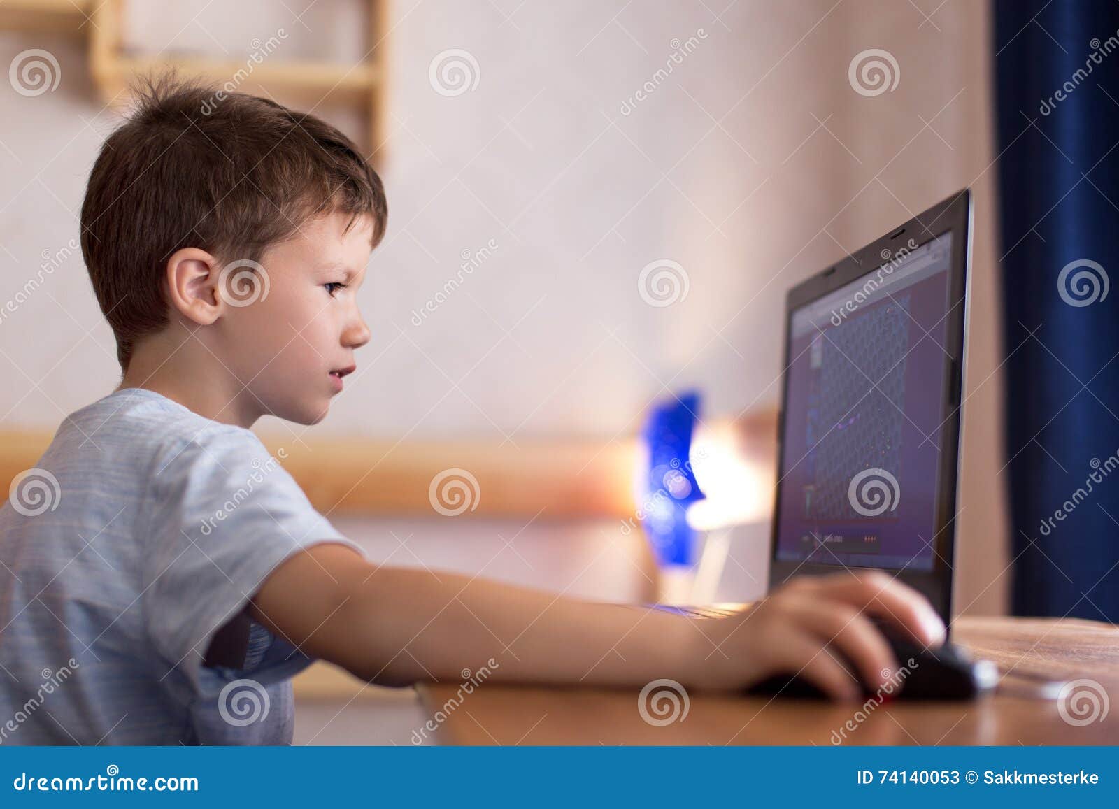 Little Dependent Boy Playing Game on Laptop Stock Image - Image of ...