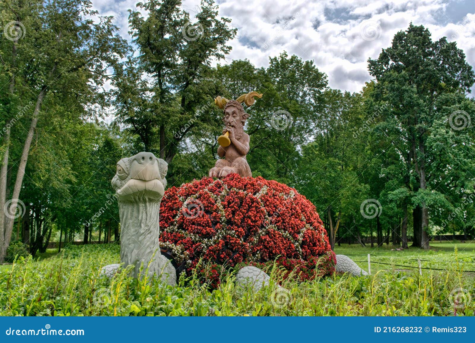 A Little Devil on a Big Turtle Stock Photo - Image of statue, devil ...