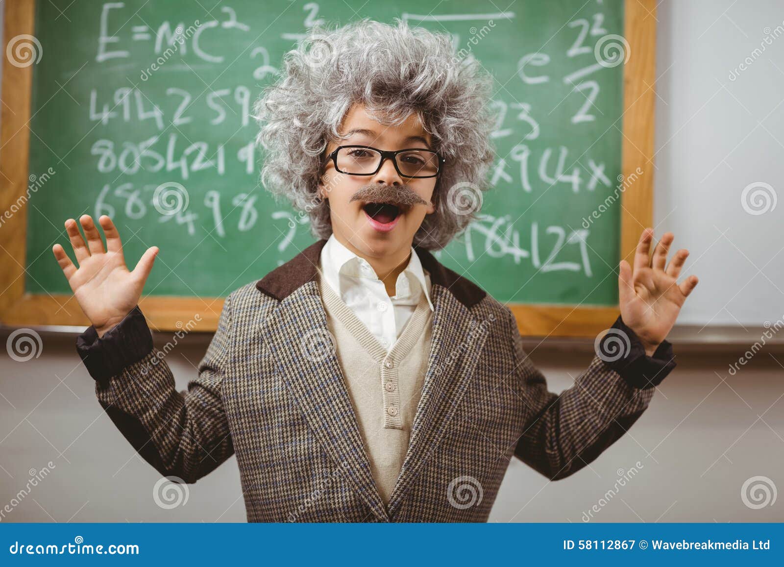 Little Einstein Smiling in Front of Chalkboard Stock Image - Image of ...