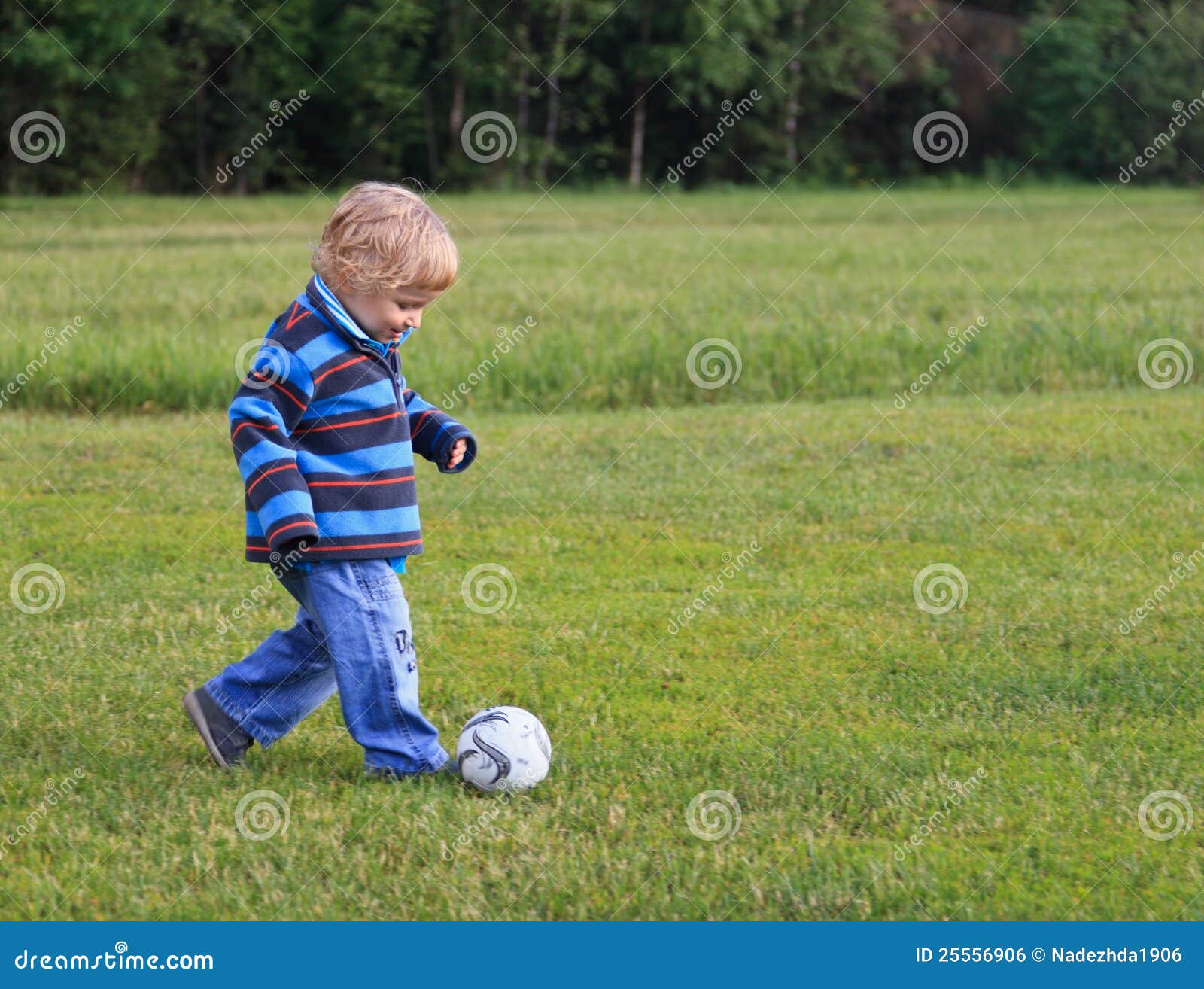 Little football player stock photo. Image of field, little - 25556906