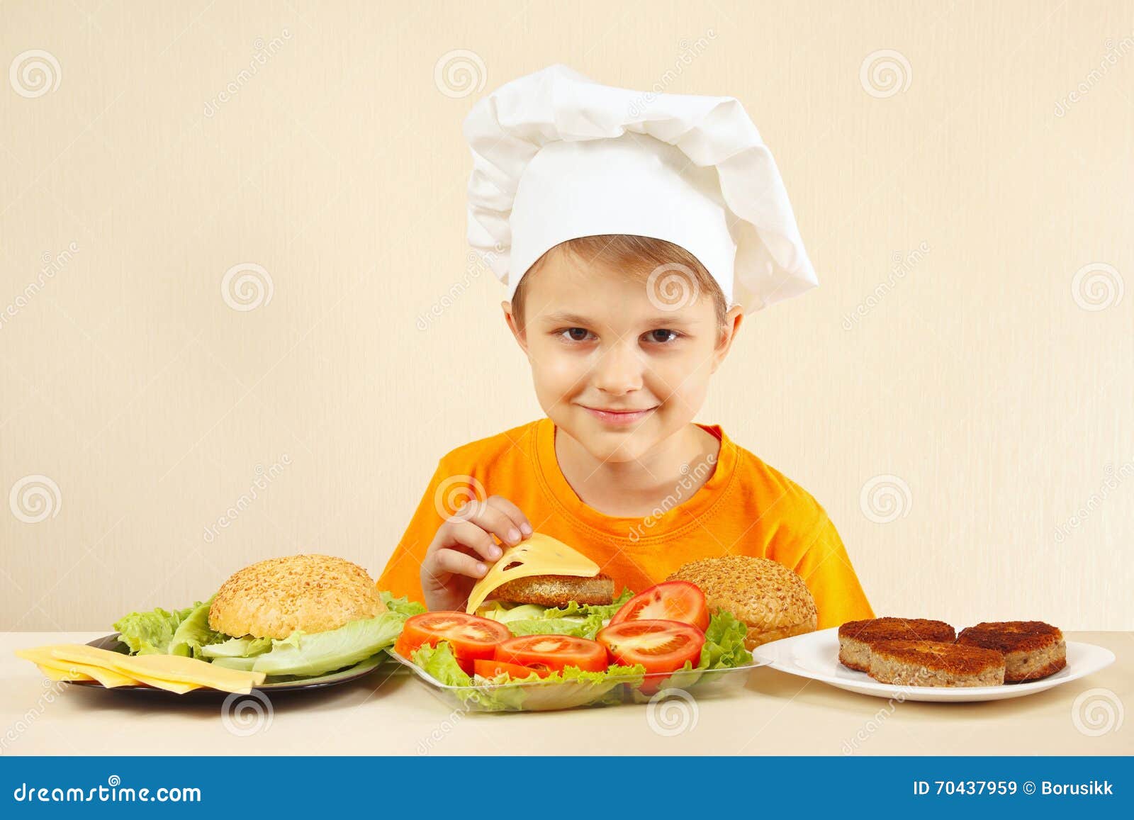 Little Funny Chef Puts Cheese on Hamburger Stock Image - Image of cook ...