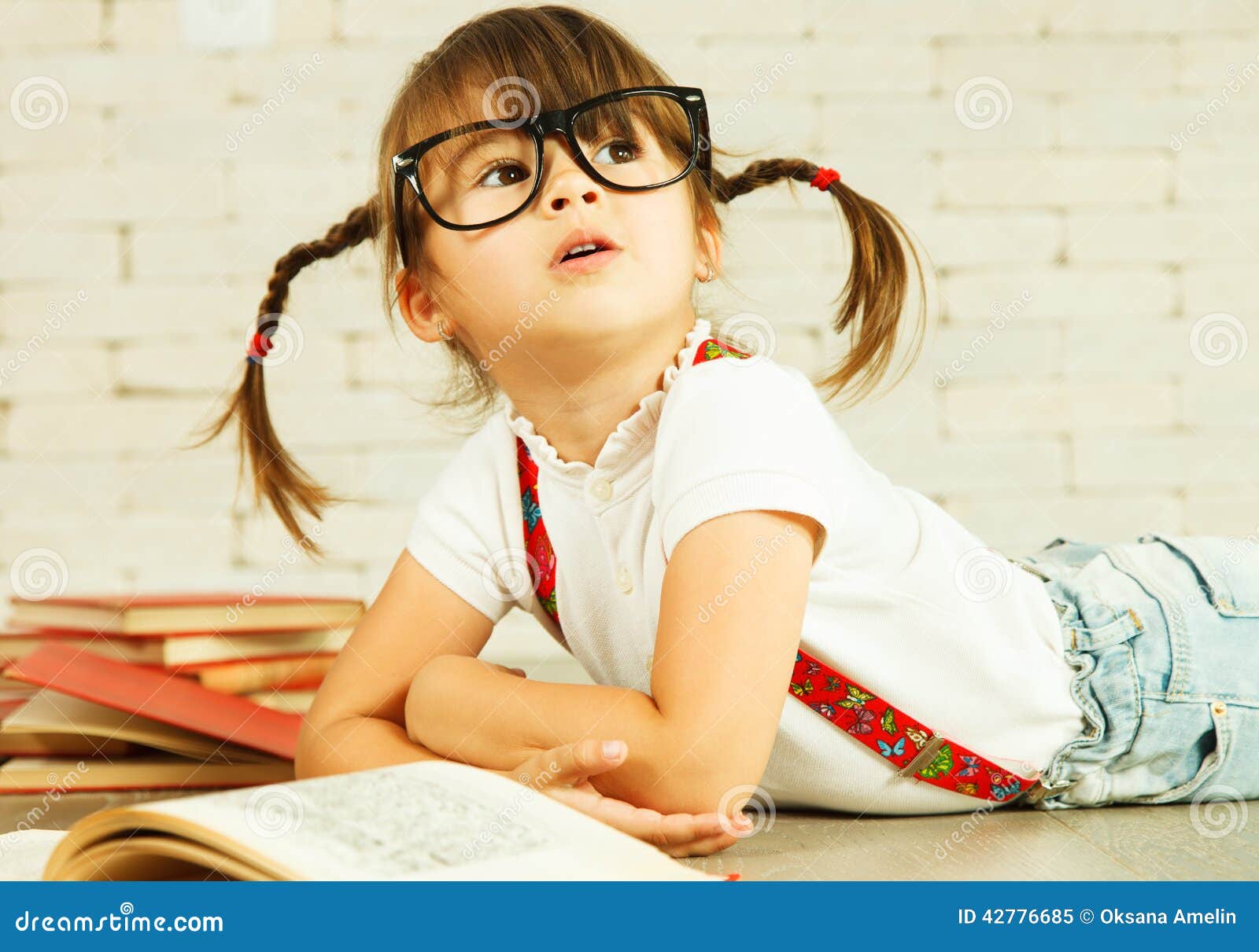 Little genius with books stock image. Image of creativity - 42776685