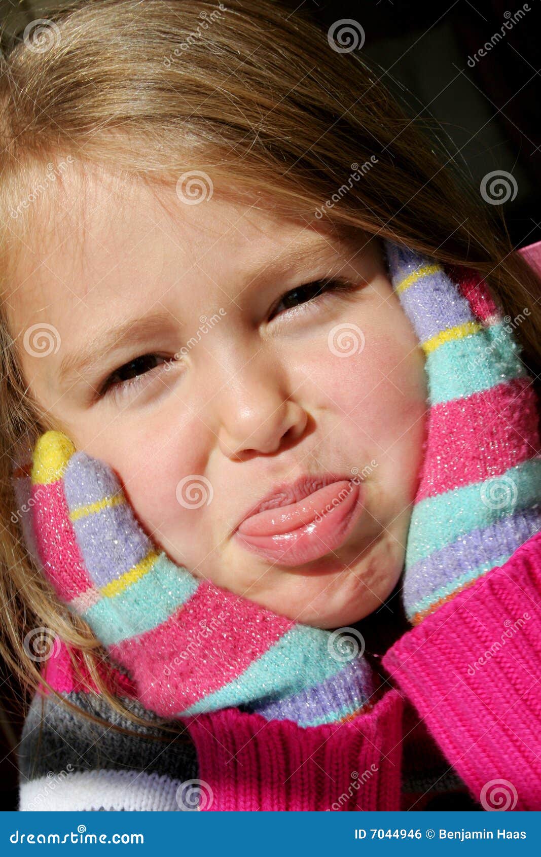 Little Cheeky Girl With Medals Smiling, Showing Young Female Power ...