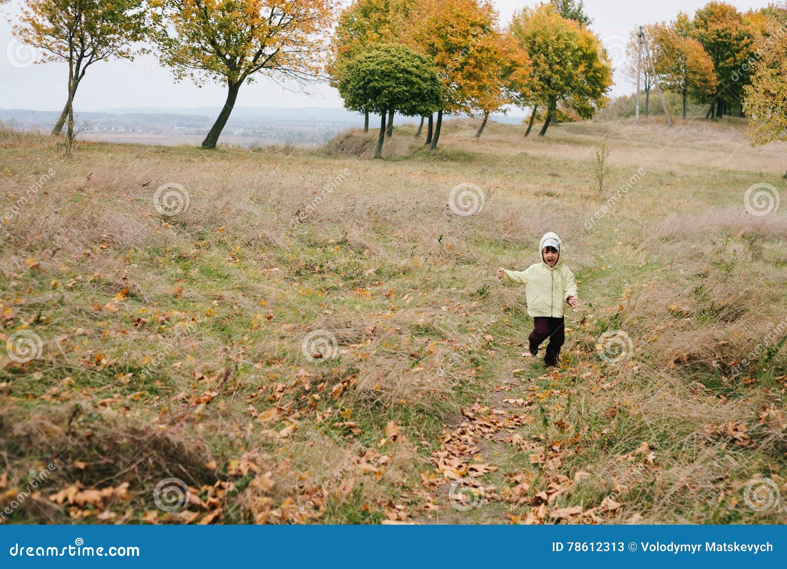 Little Girl in the Autumn Park. Run Pathway Stock Image - Image of ...