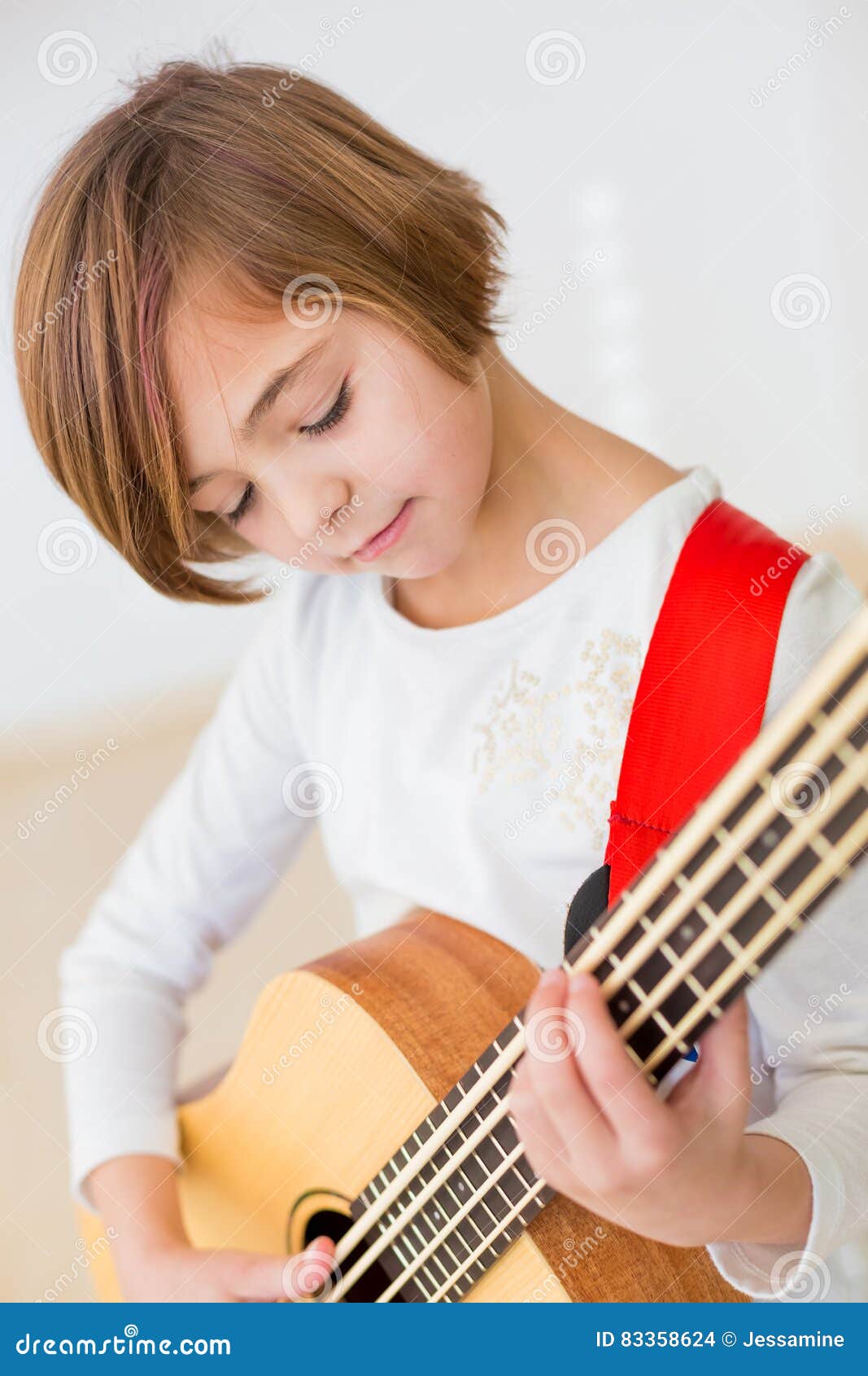 Little girl with bass stock photo. Image of training - 83358624