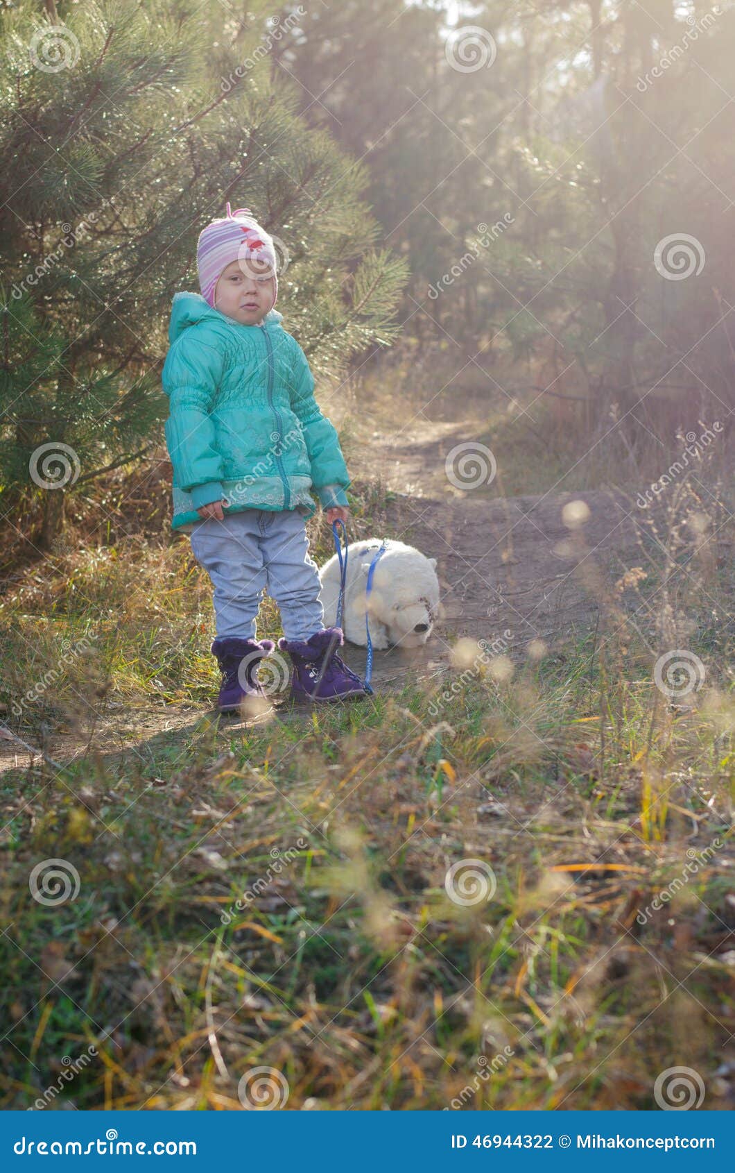 Little girl with bear stock photo. Image of nature, plush - 46944322