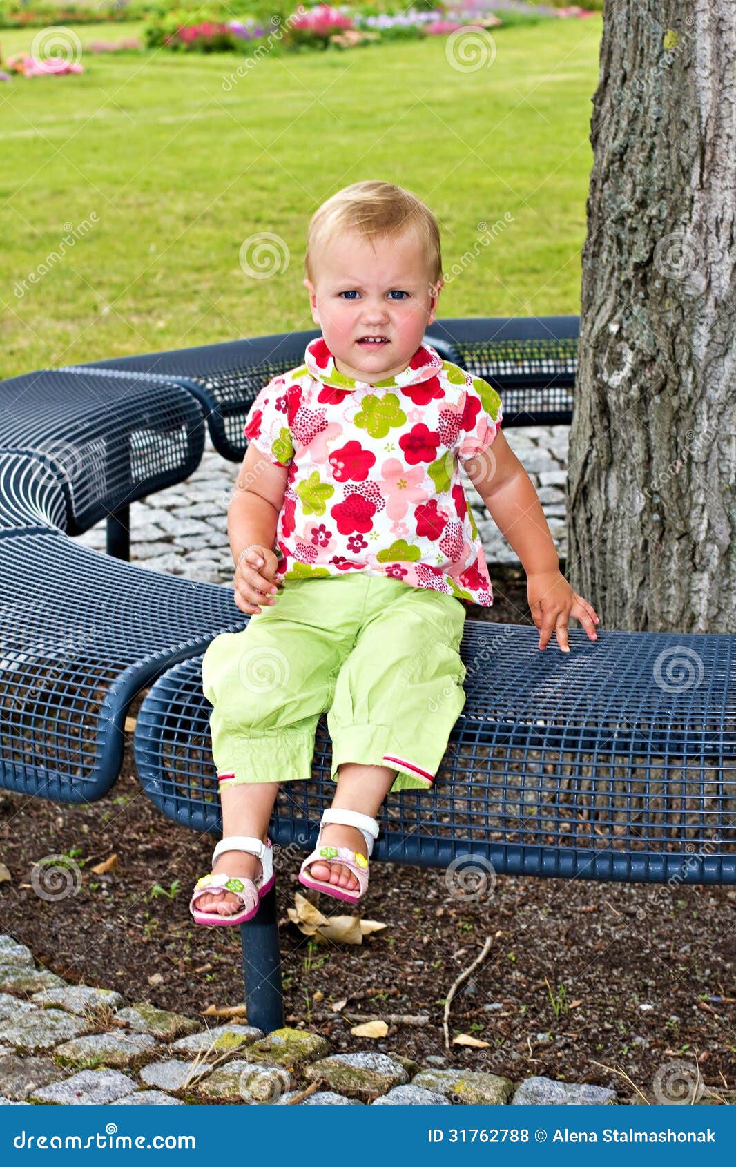 Little girl on bench stock photo. Image of nice, expression - 31762788