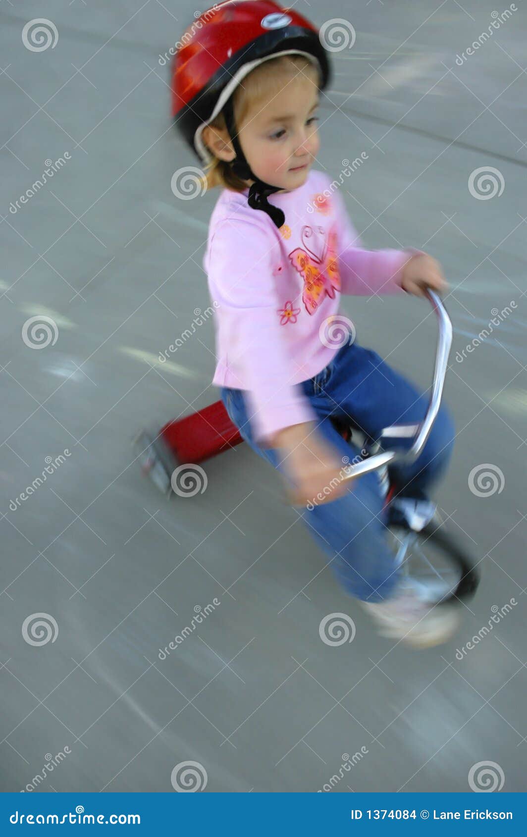 Little Girl Biking stock photo. Image of smiles, active - 1374084