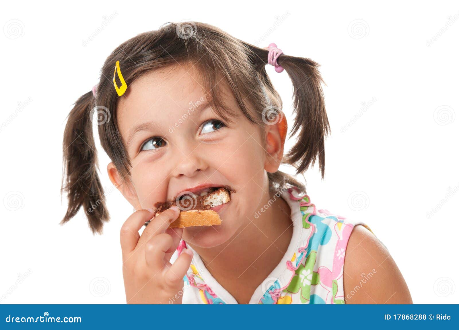 Little girl biting a snack stock photo. Image of lifestyle - 17868288