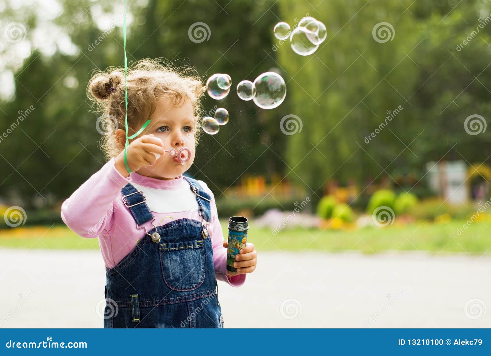 Little girl blow bubbles stock photo. Image of summer - 13210100