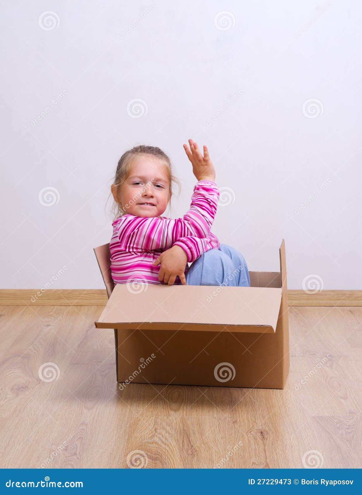 Little girl in a box stock image. Image of interior, caucasian - 27229473