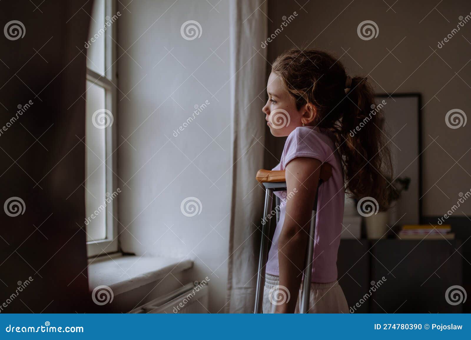 Little Girl with Broken Leg Looking Trough Window. Stock Photo - Image ...