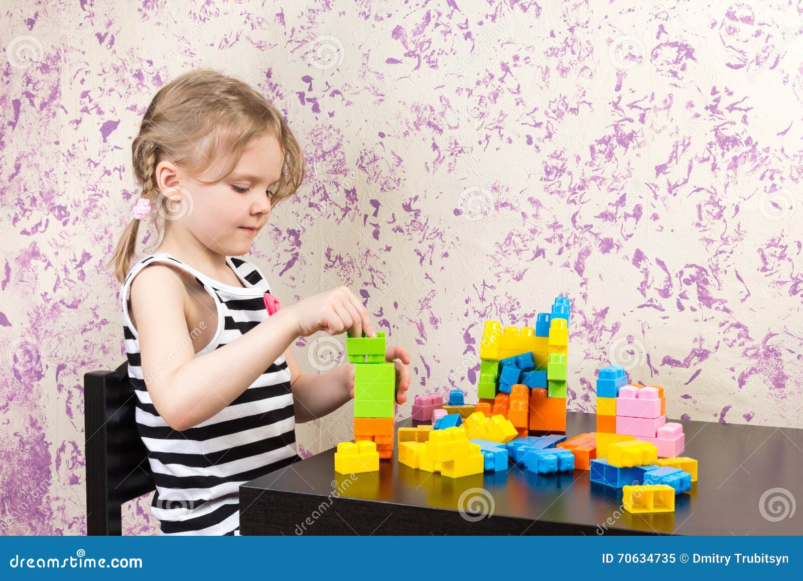 Little Girl Builds Bricks at Table Stock Image - Image of childhood ...