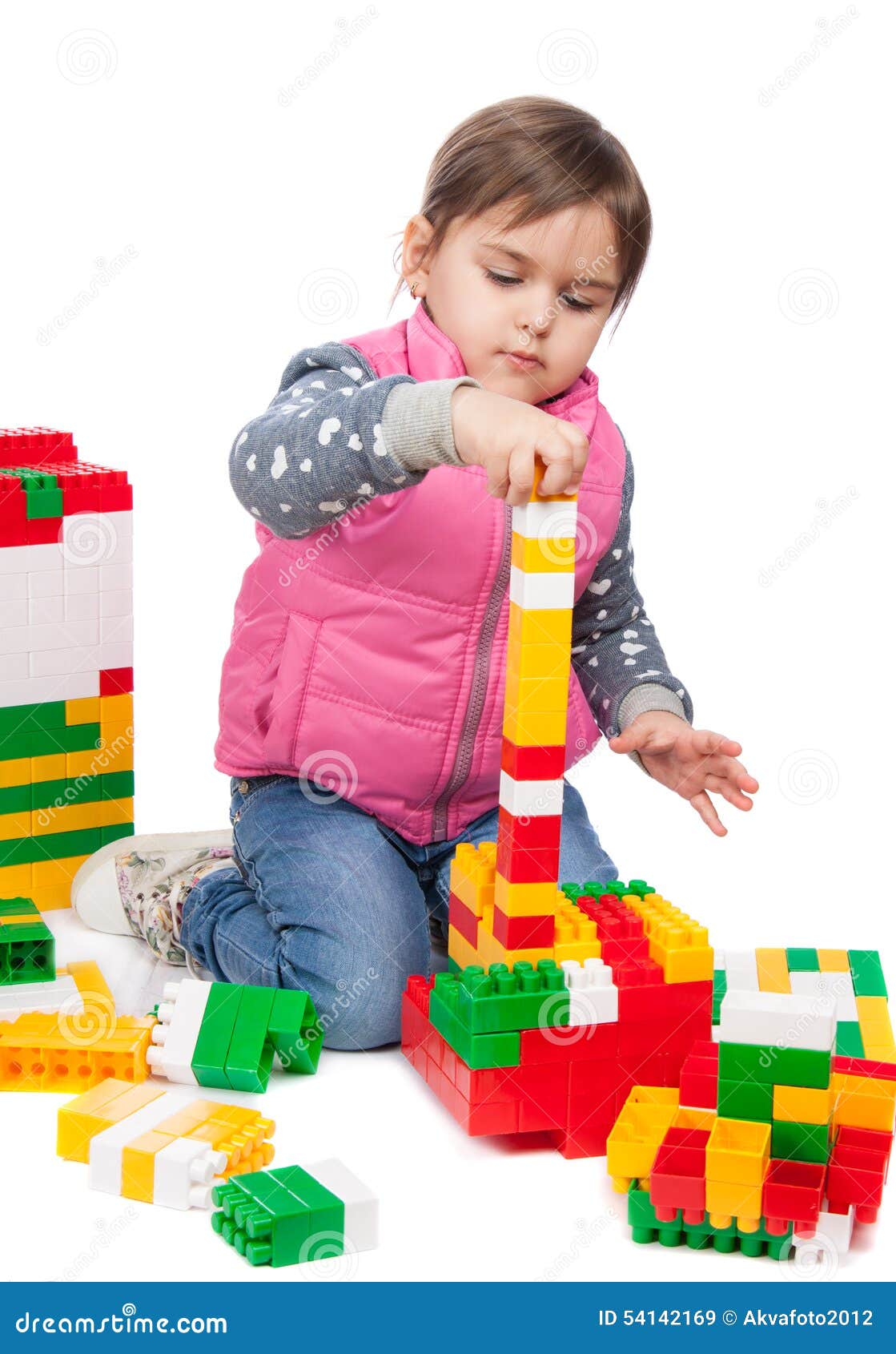Little girl builds a tower stock image. Image of game - 54142169