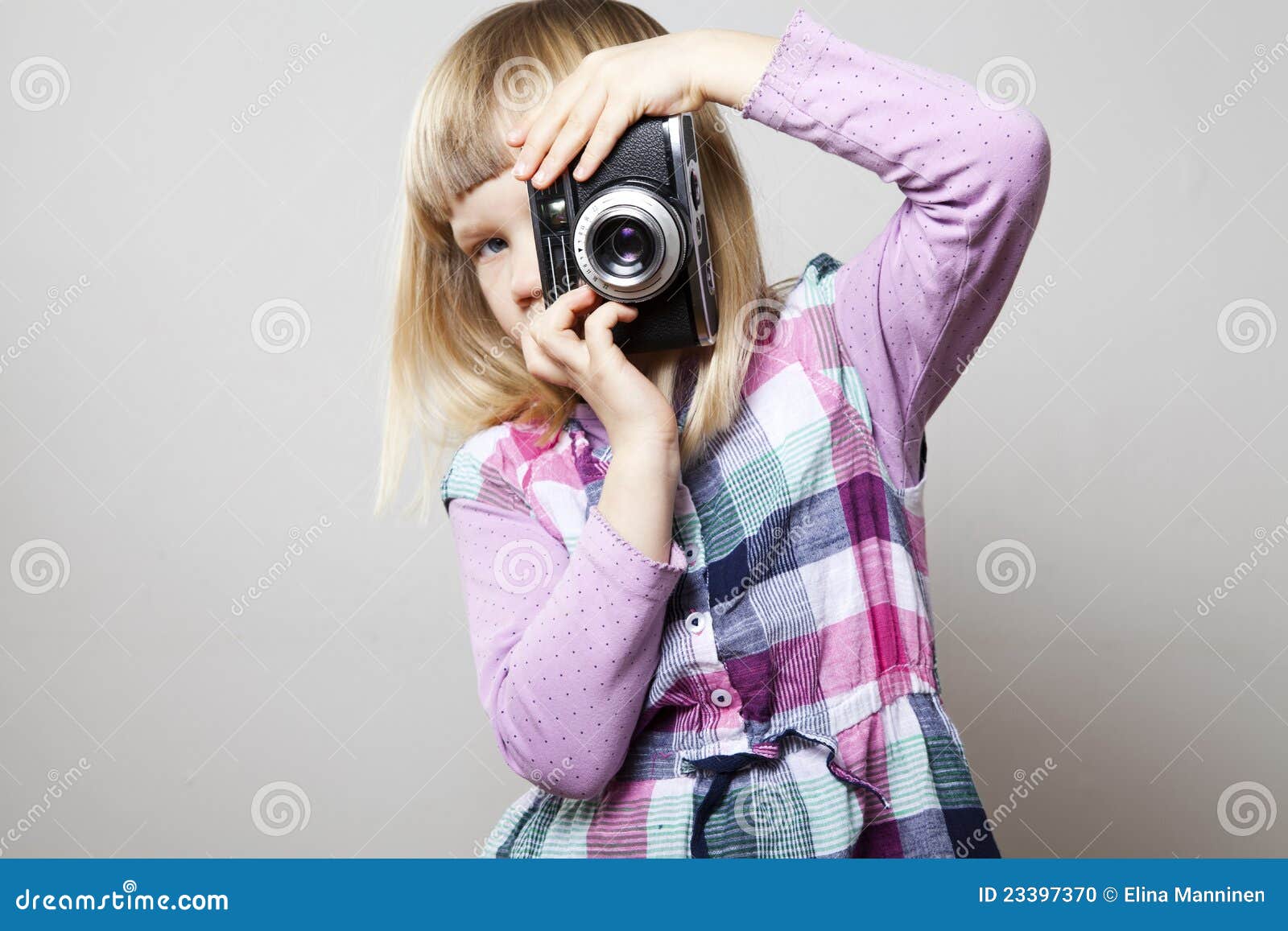 Little girl with camera stock photo. Image of childhood - 23397370
