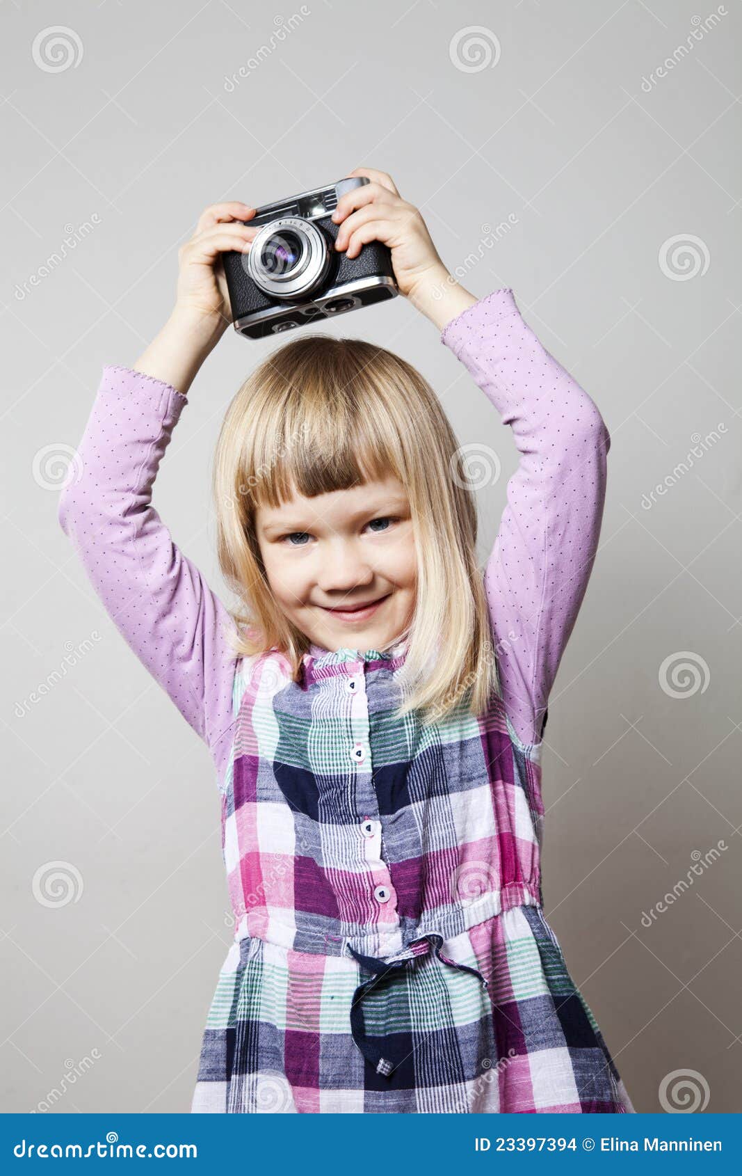 Little girl with camera stock photo. Image of childhood - 23397394