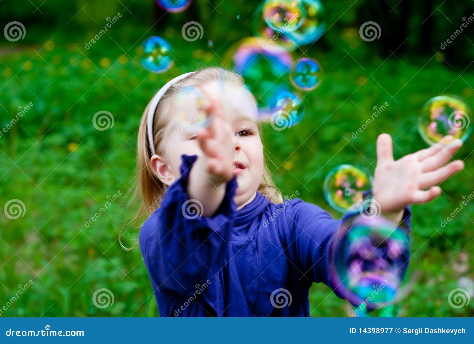 Little Girl Catching Bubbles Stock Image - Image of carefree, cheerful ...