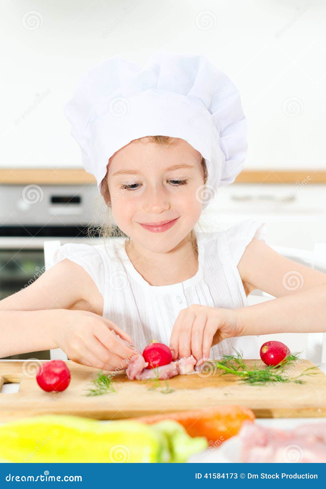 Little girl in chef hat. stock image. Image of enjoyment - 41584173