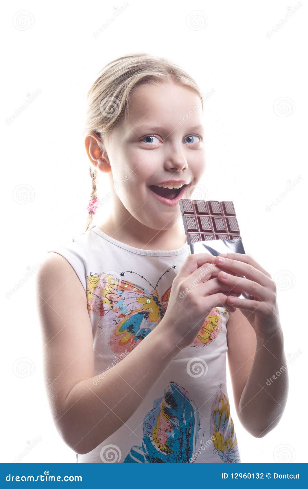 Little girl with chocolate stock photo. Image of emotional - 12960132