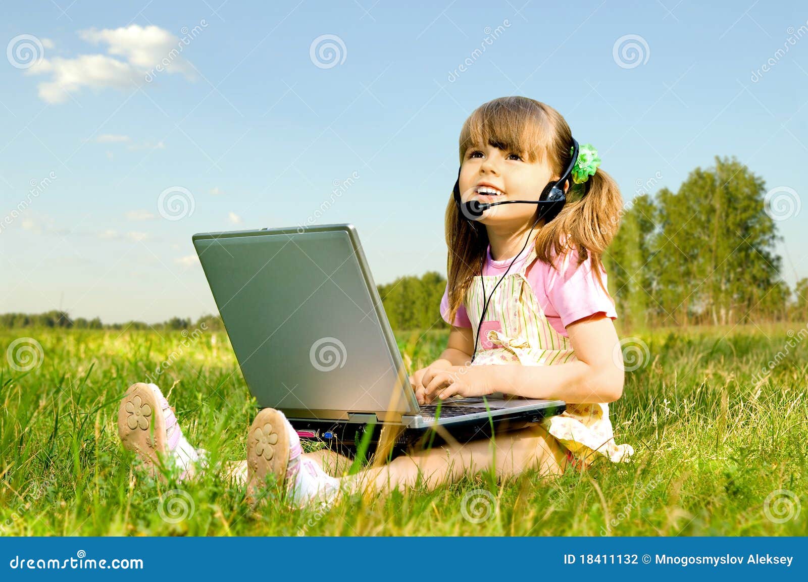Little girl with computer stock photo. Image of cutie - 18411132