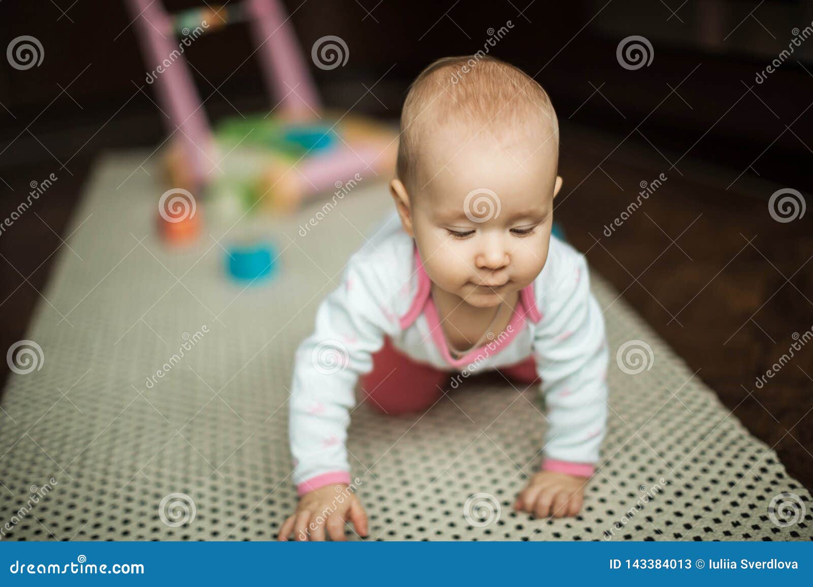 Little Girl Crawling on the Floor on the Carpet at Home Stock Image ...