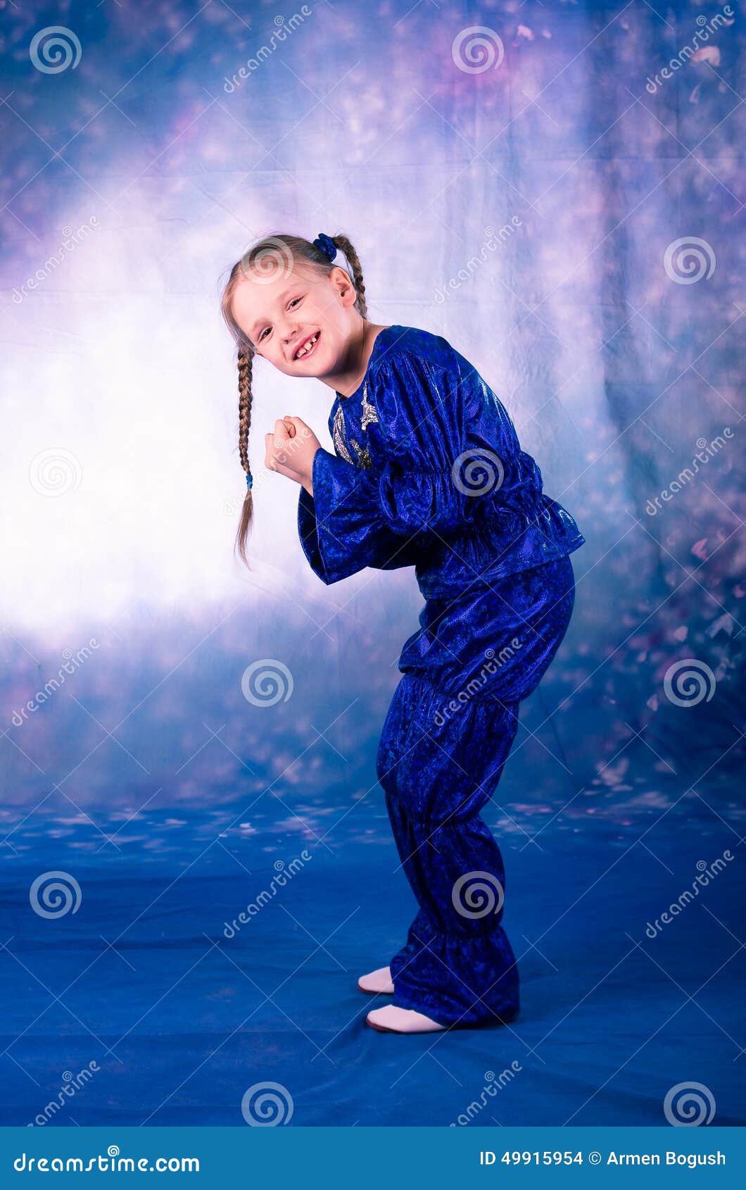 Little Girl Dancing in the Blue Costume Stock Photo - Image of hair ...