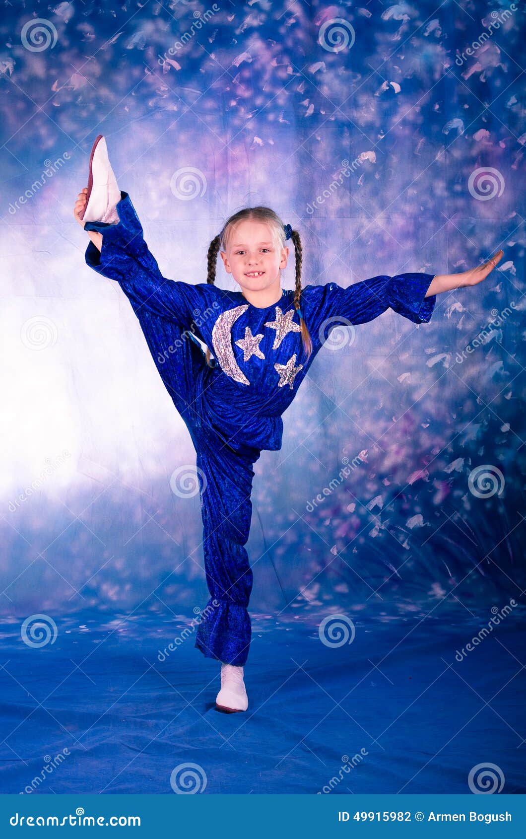 Little Girl Dancing in the Blue Costume Stock Photo - Image of hand ...