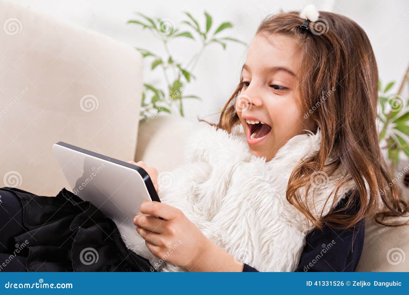 Little Girl with Digital Tablet Stock Photo - Image of people, focus ...