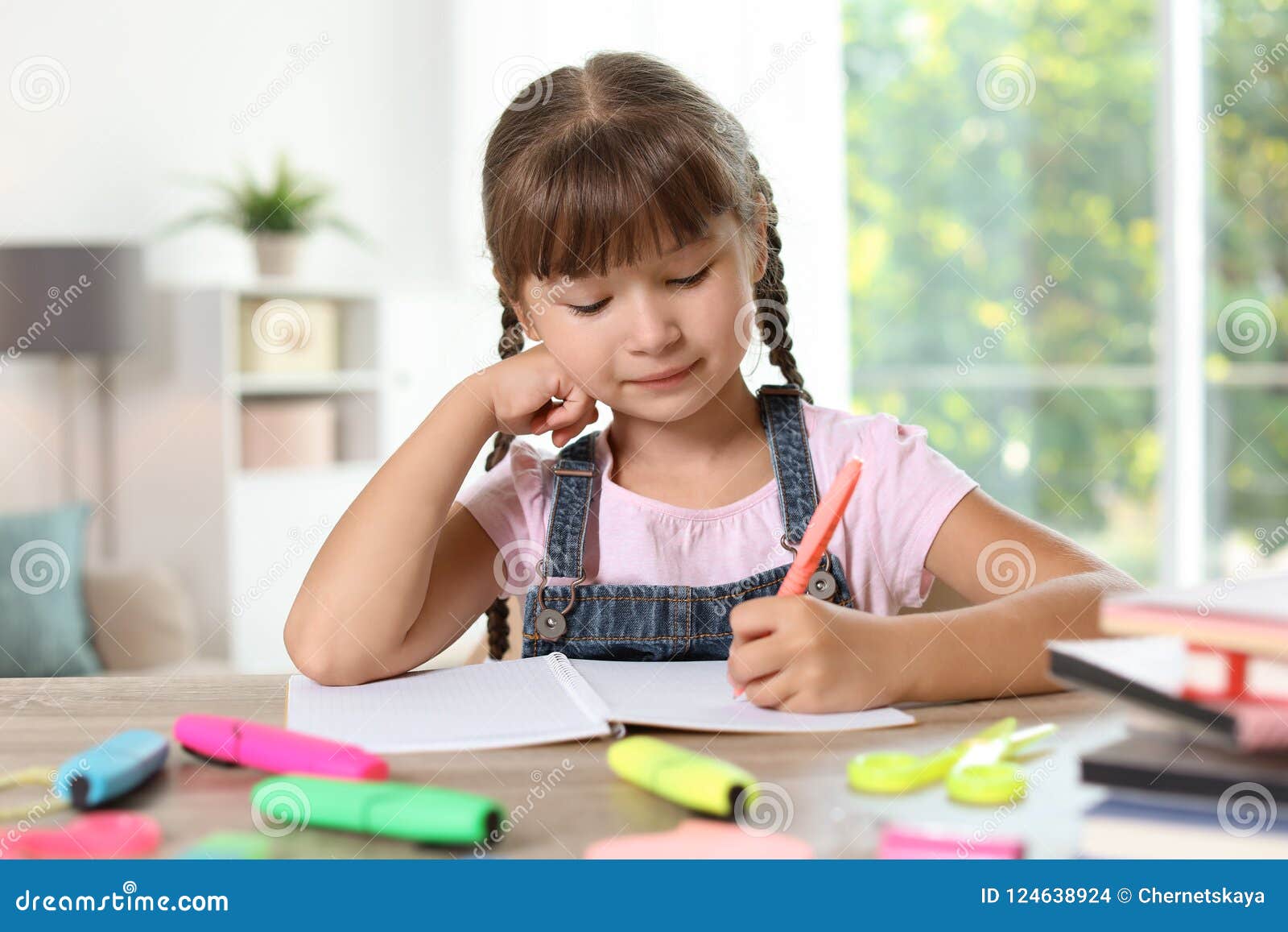 Little Girl Doing Assignment at Home Stock Photo - Image of indoors ...