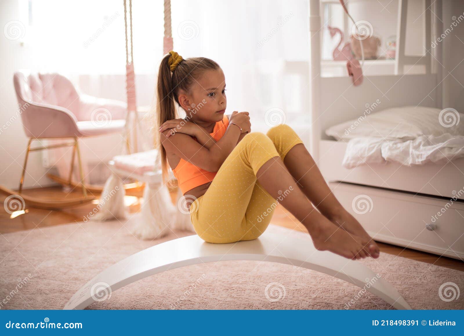 Little Girl Doing Crunches at Home. Stock Image - Image of active ...
