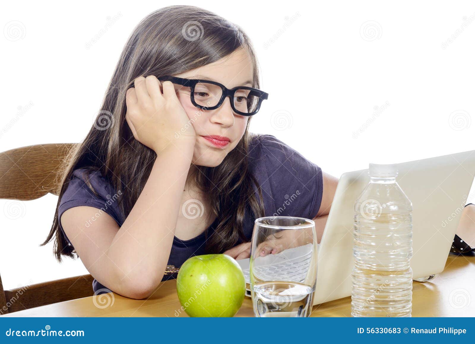A Little Girl Doing Her Homework on Her Computer Stock Image - Image of ...