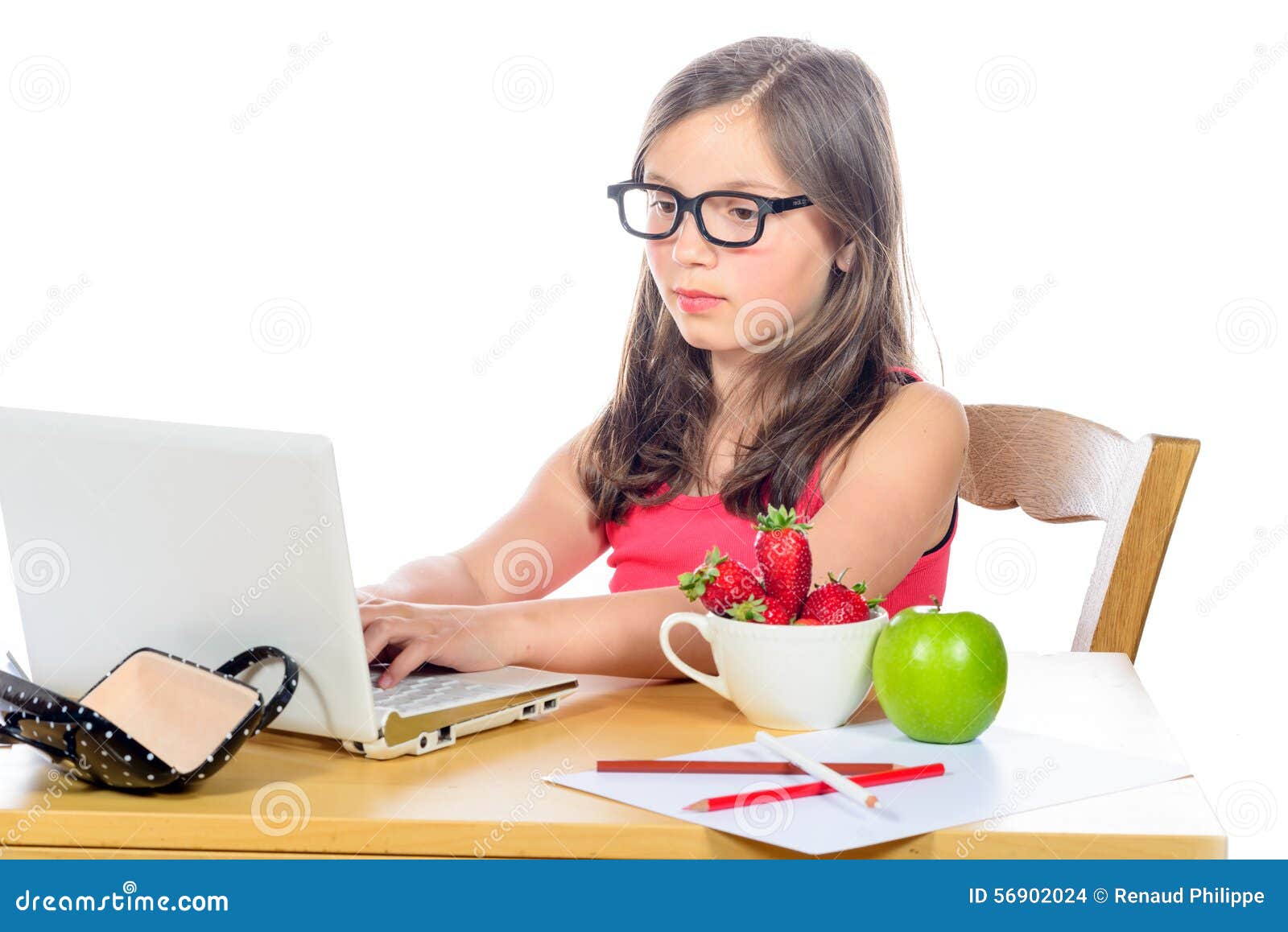A Little Girl Doing Her Homework on Her Computer Stock Photo - Image of ...