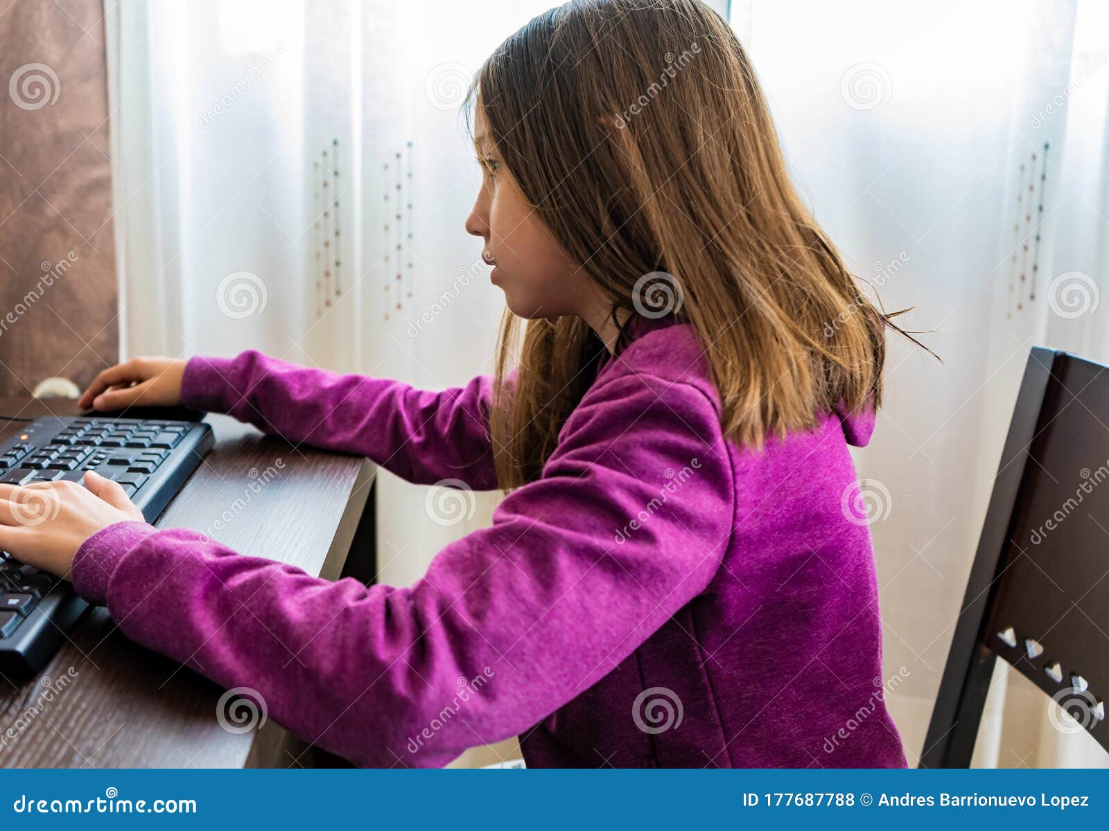 Little Girl Doing Homework by the Computer Stock Photo - Image of cell ...