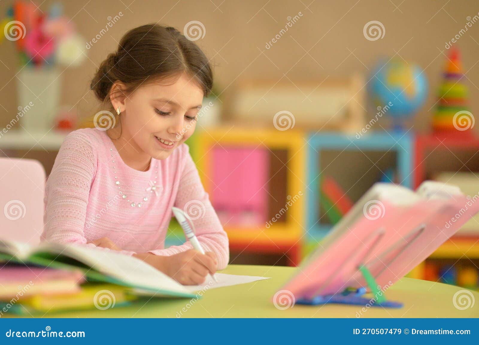 Little Girl Doing Homework at the Table at Home Stock Image - Image of ...