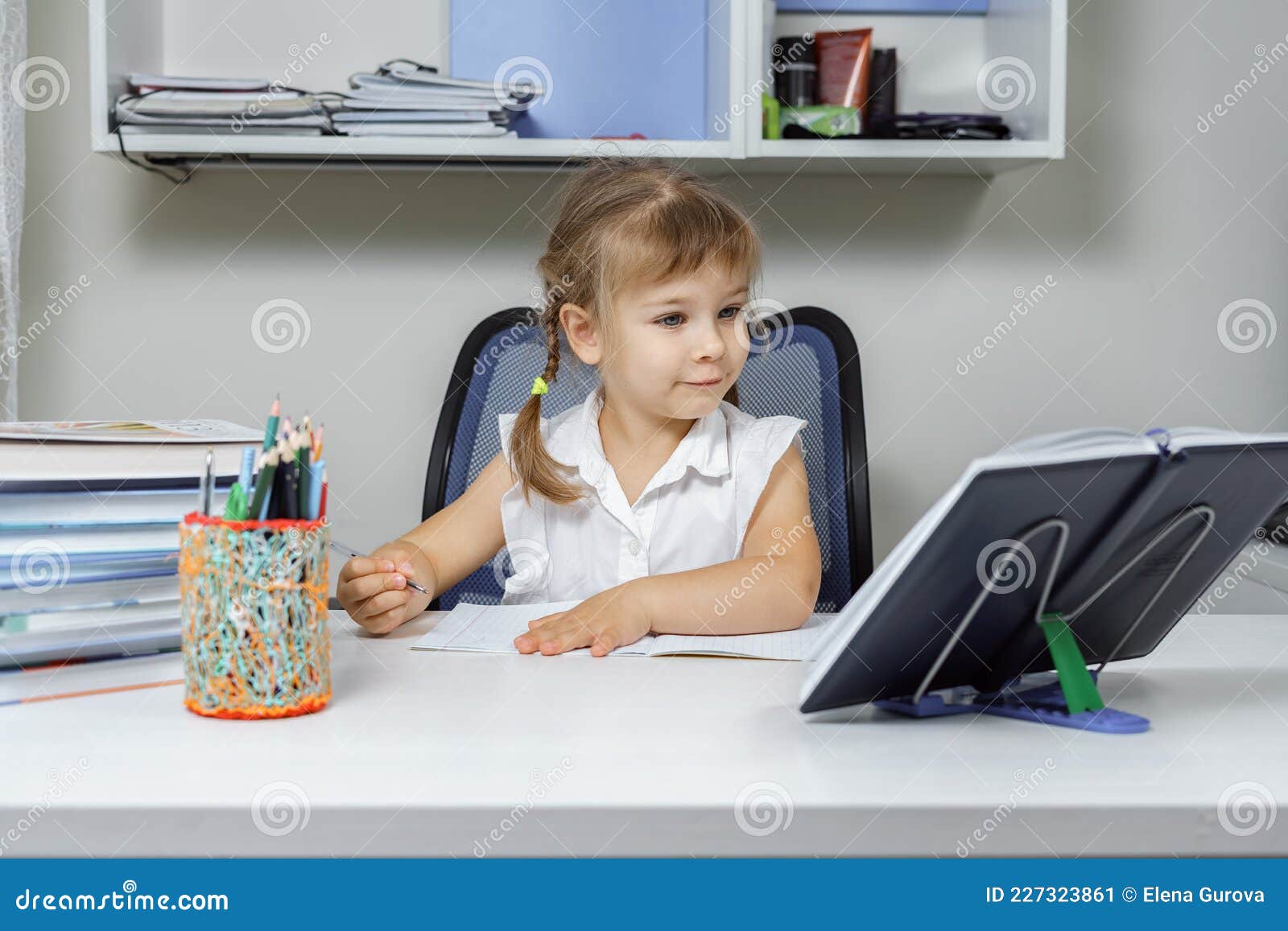 Little Girl Doing Homework at the Table Stock Image - Image of read ...