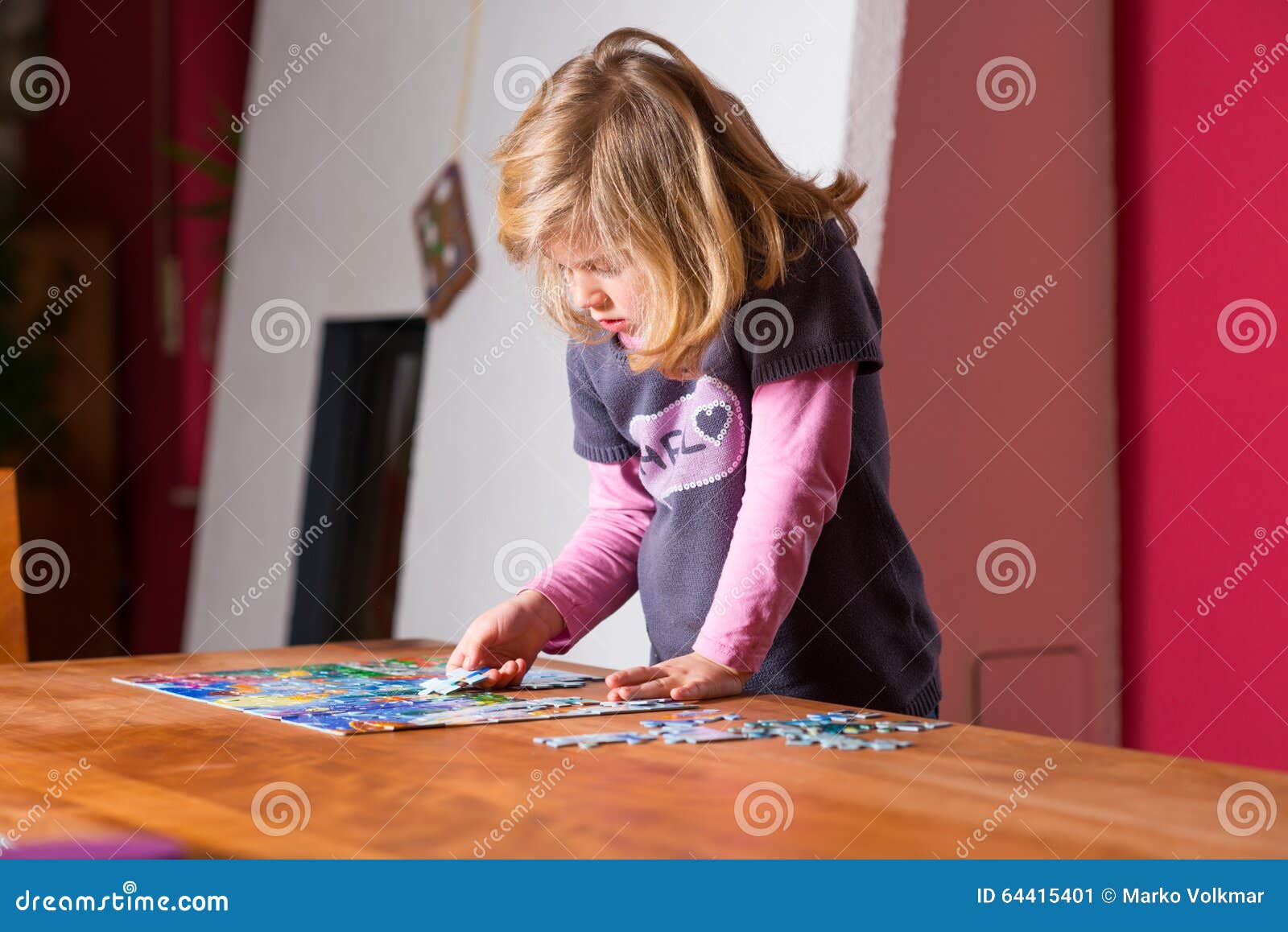 Little Girl Doing a Jigsaw Puzzle Stock Image - Image of kids, happy ...