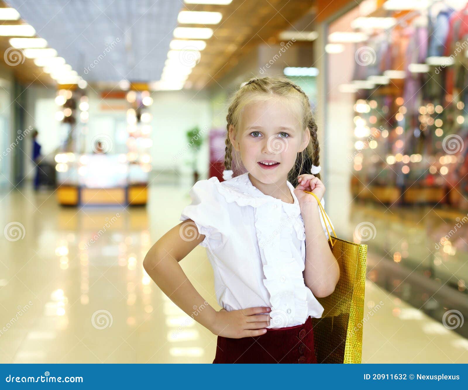 Little girl doing shopping stock photo. Image of lady - 20911632