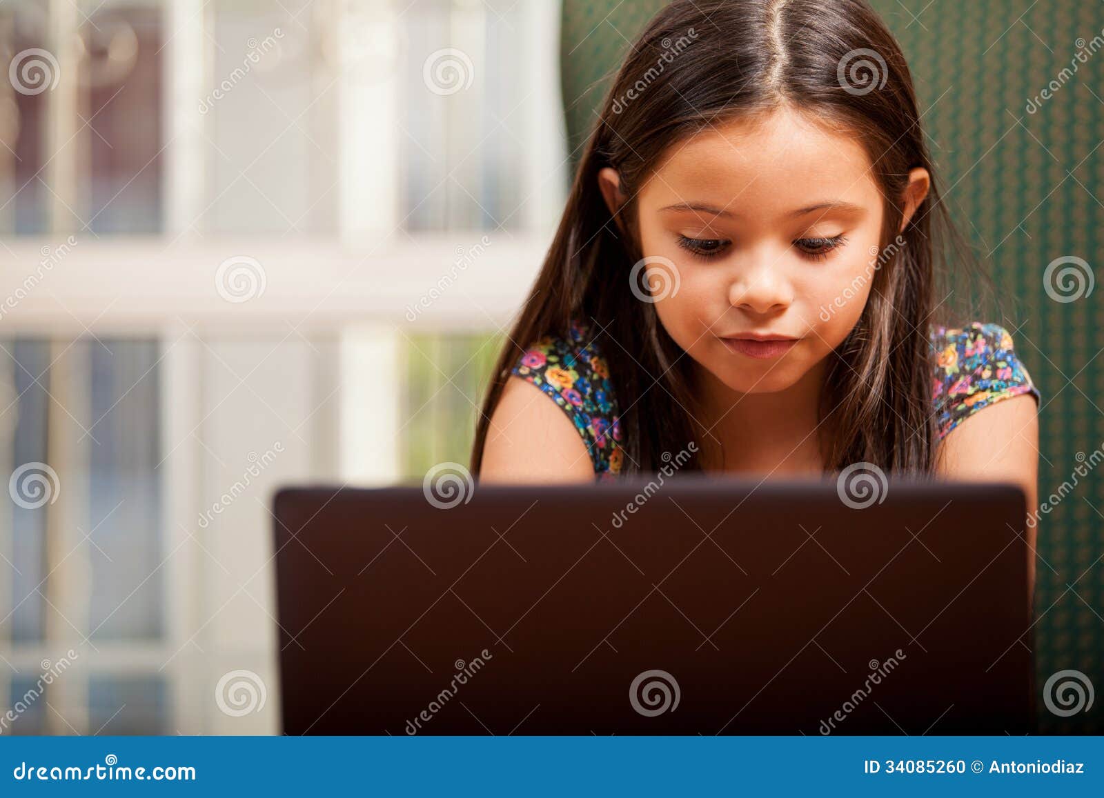 Little Girl Doing Some Homework Stock Photo - Image of laptop ...