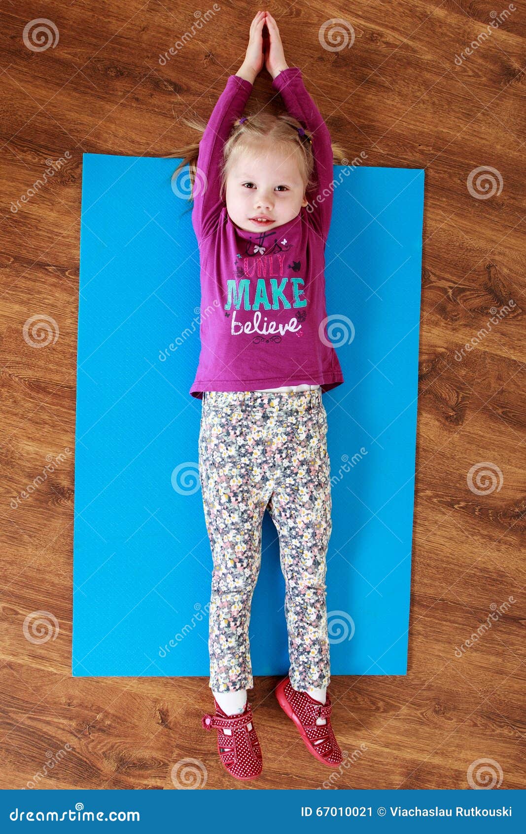 Little Girl is Doing Stretching Exercise on a Mat Stock Image - Image ...