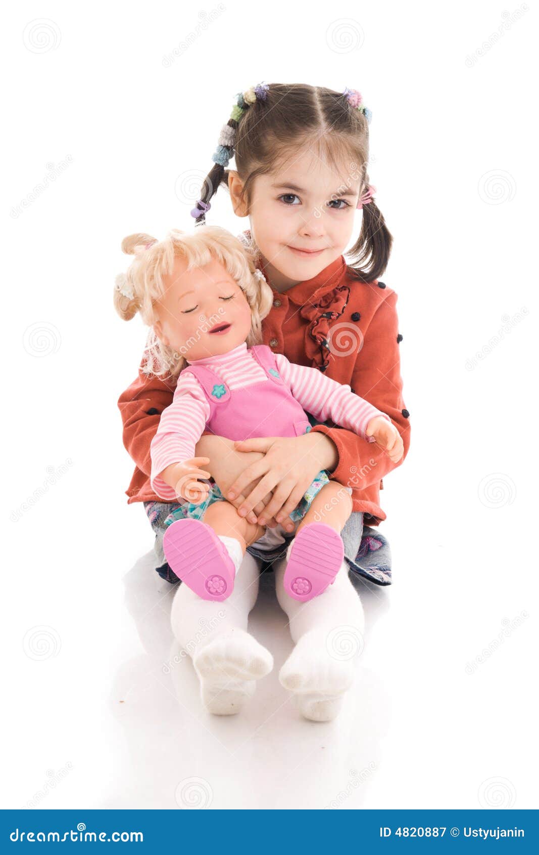 The Little Girl with a Doll Isolated on a White Stock Image - Image of ...