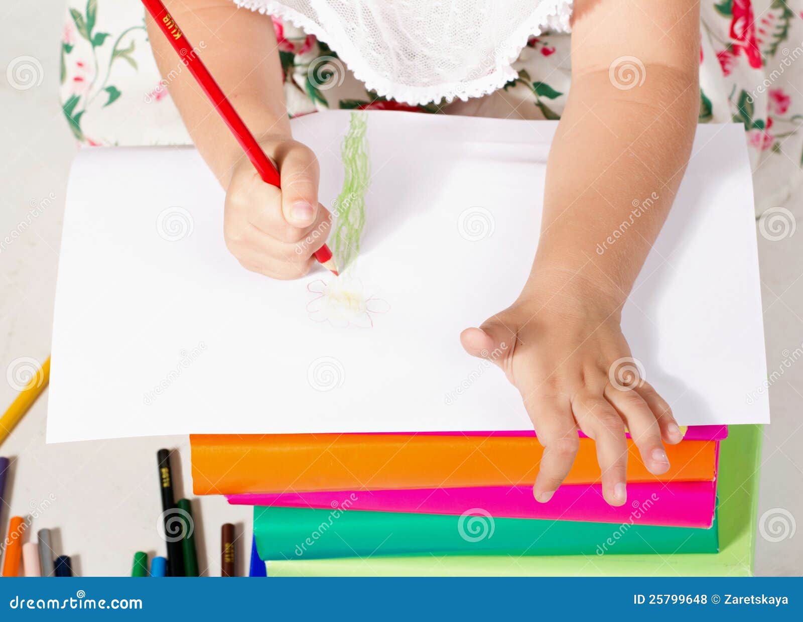Little girl drawing crayon stock photo. Image of design - 25799648
