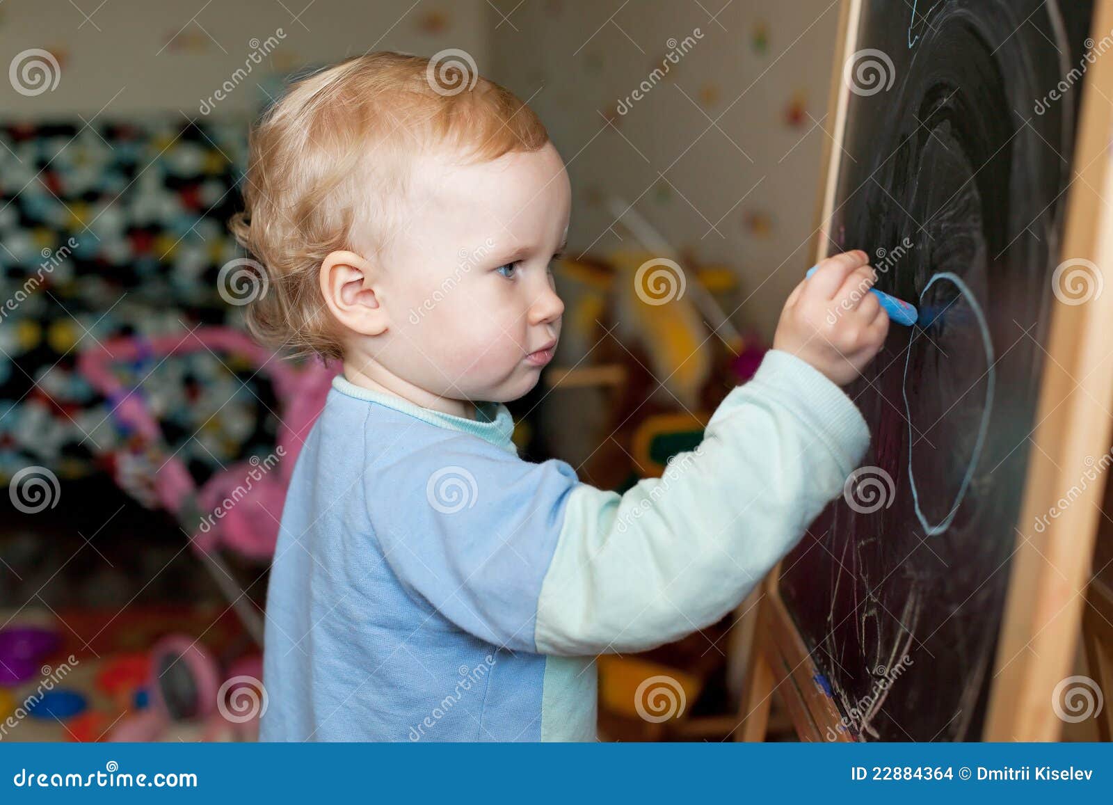 Little Girl Draws with Chalk on a Blackboard Stock Photo - Image of ...