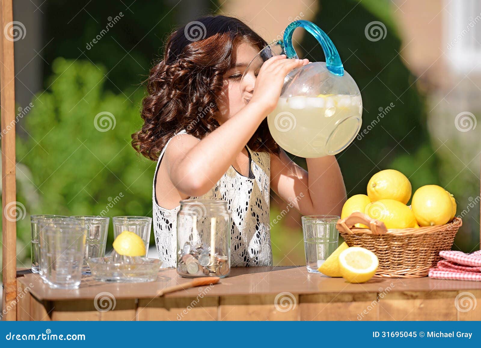 Little Girl Drinking from Lemonade Pitcher Stock Image - Image of fruit ...